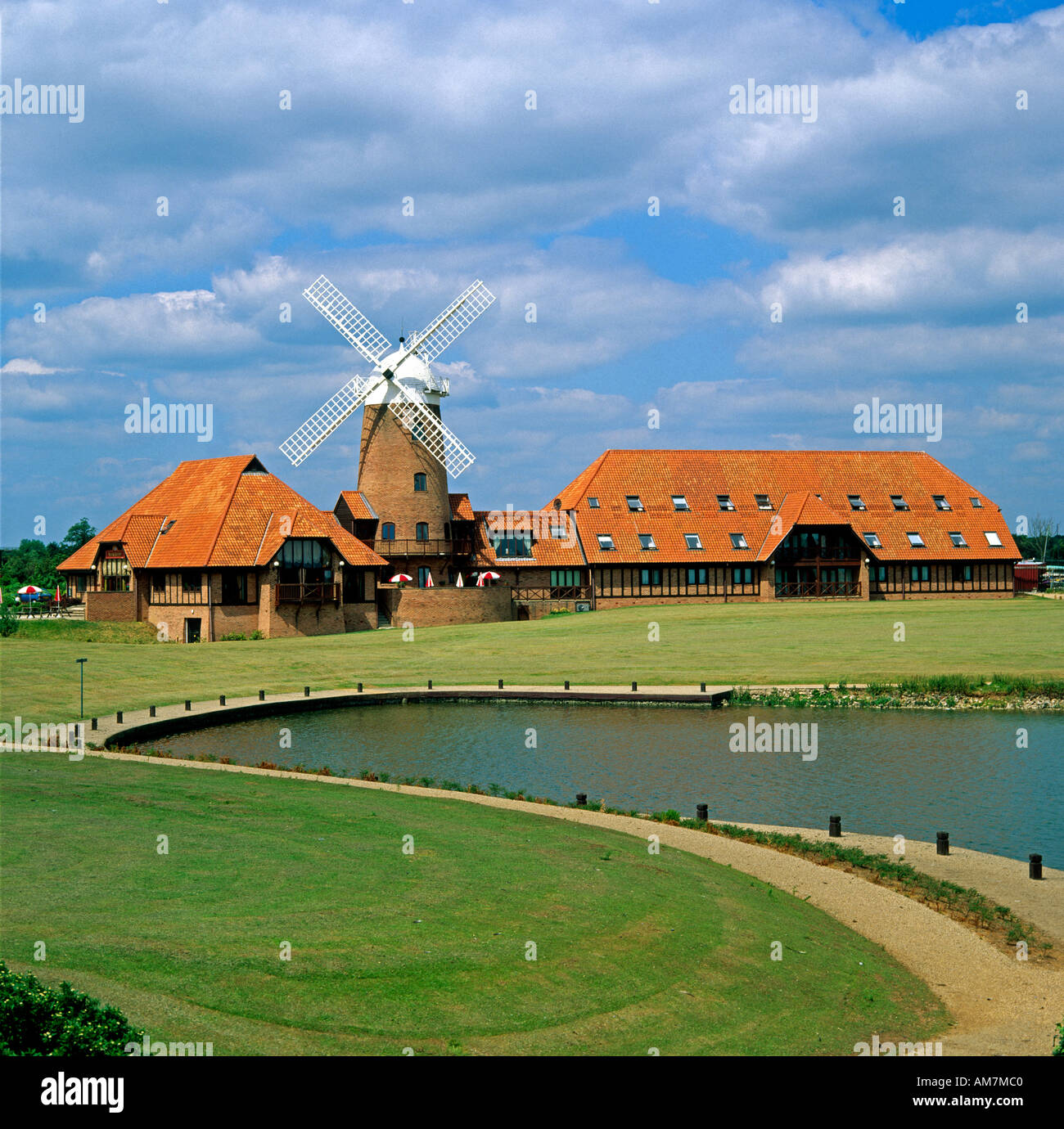 Windmill and lake near Milton Keynes Buckinghamshire England Stock ...