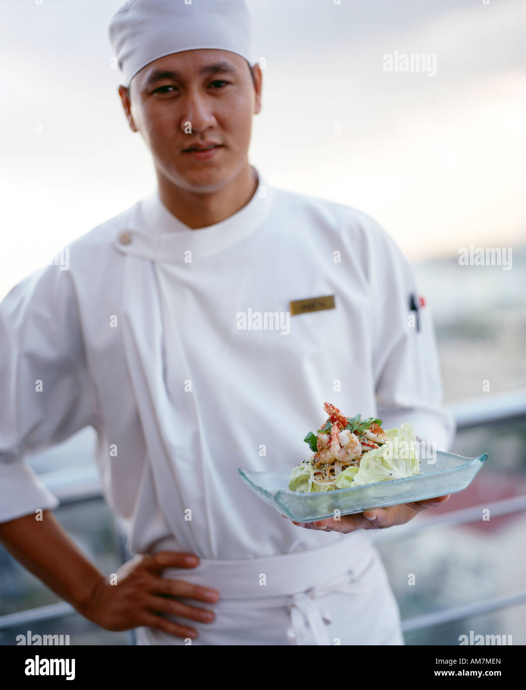 Male chef presents food hi-res stock photography and images - Alamy