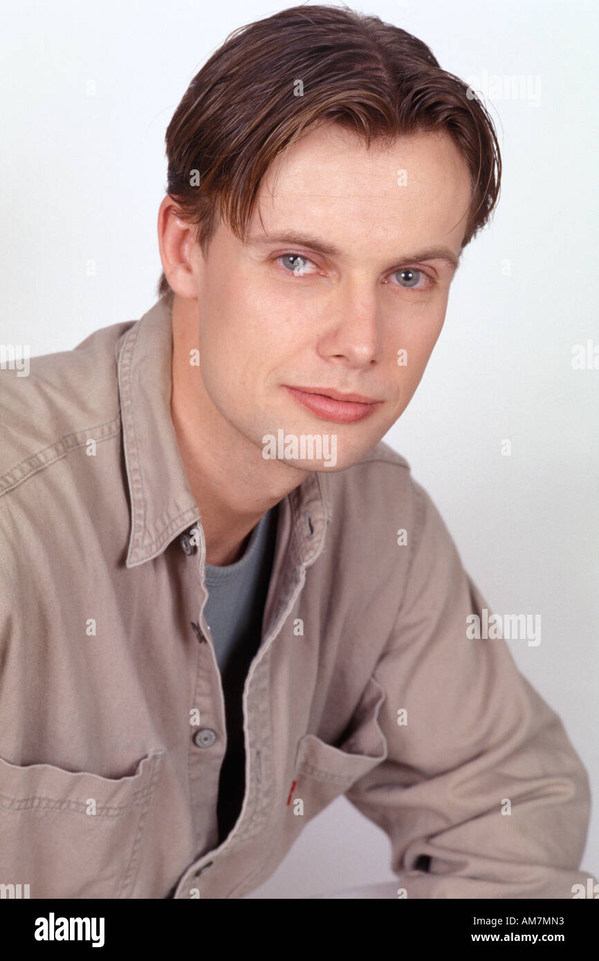 Mid adult man staring , portrait Stock Photo - Alamy