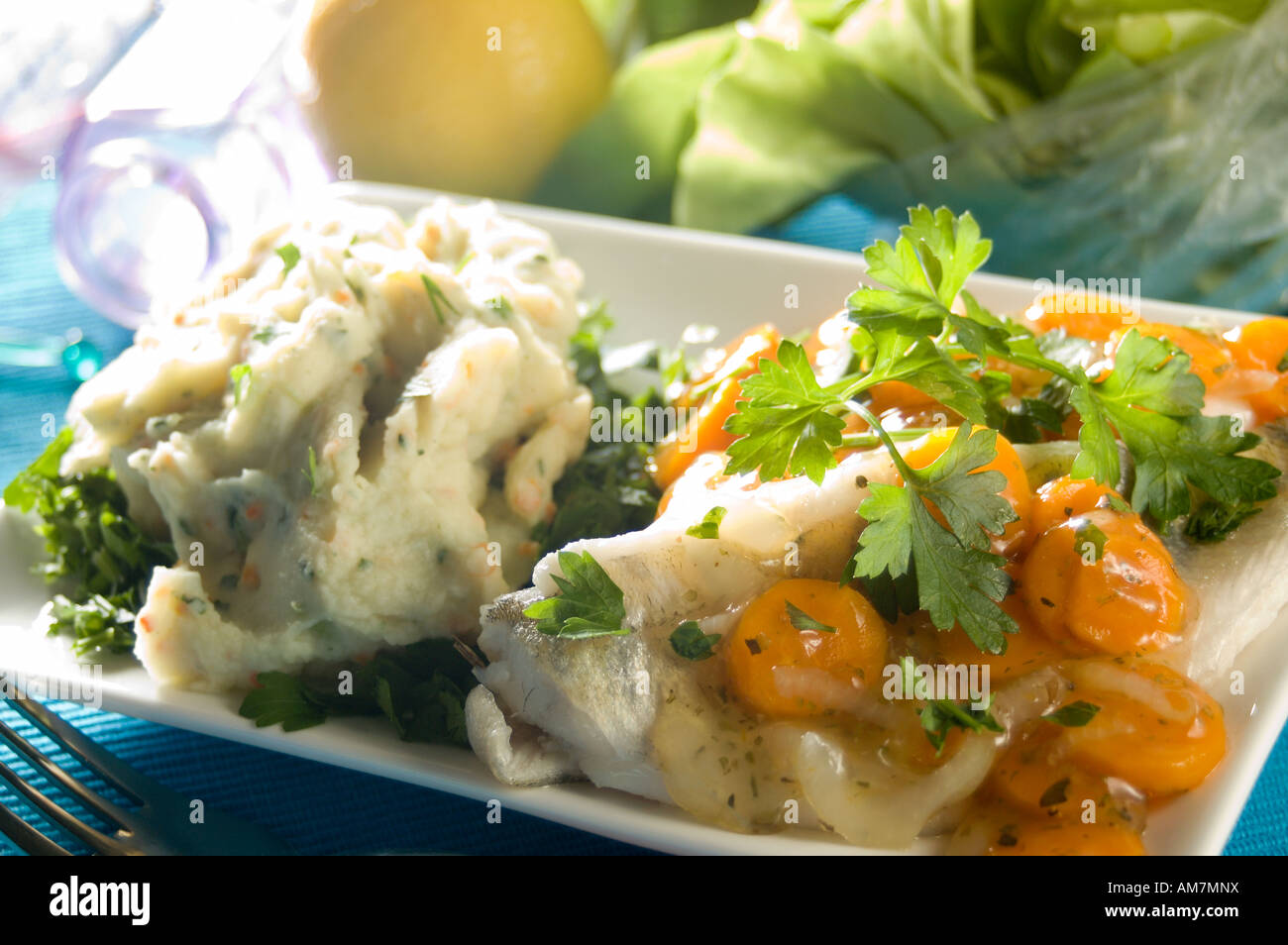 Butterfish with potato purée and carrot sauce Stock Photo - Alamy