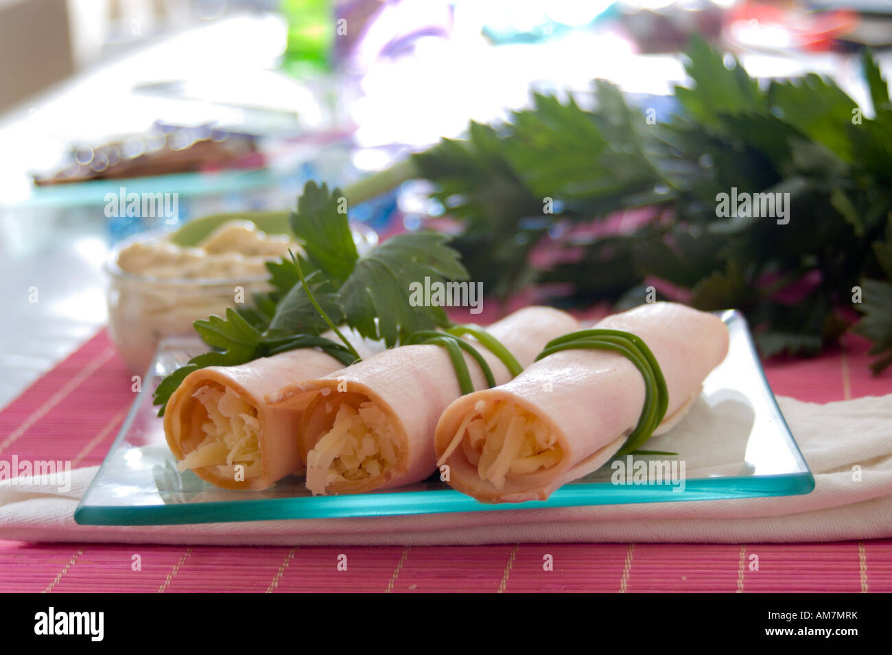 Ham rolls stuffed with cheese Stock Photo - Alamy