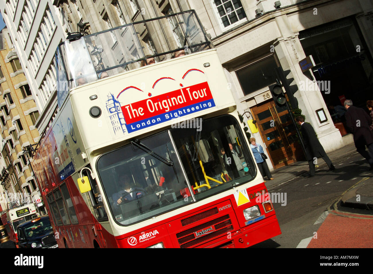 GBR, England, city tour bus in the street HAYMARKET Stock Photo - Alamy