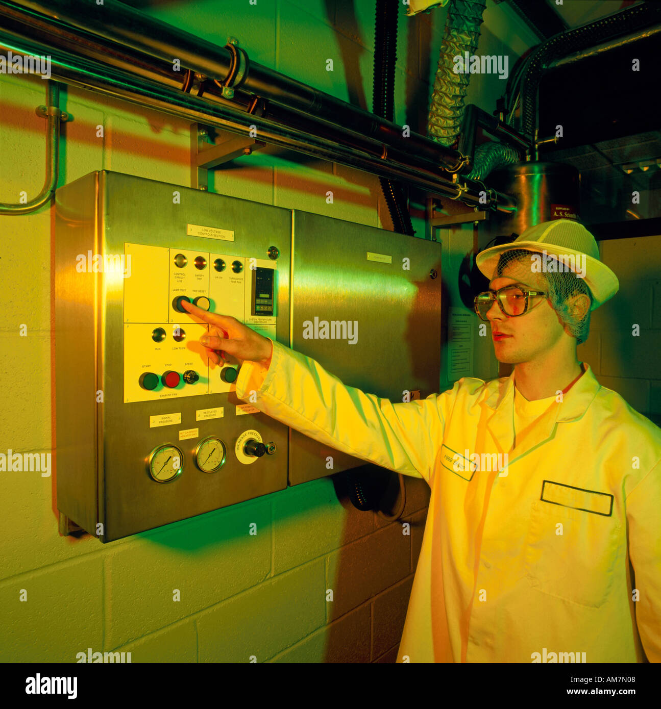 Technician worker in white overalls and headwear with 1990s Cryogenic ...