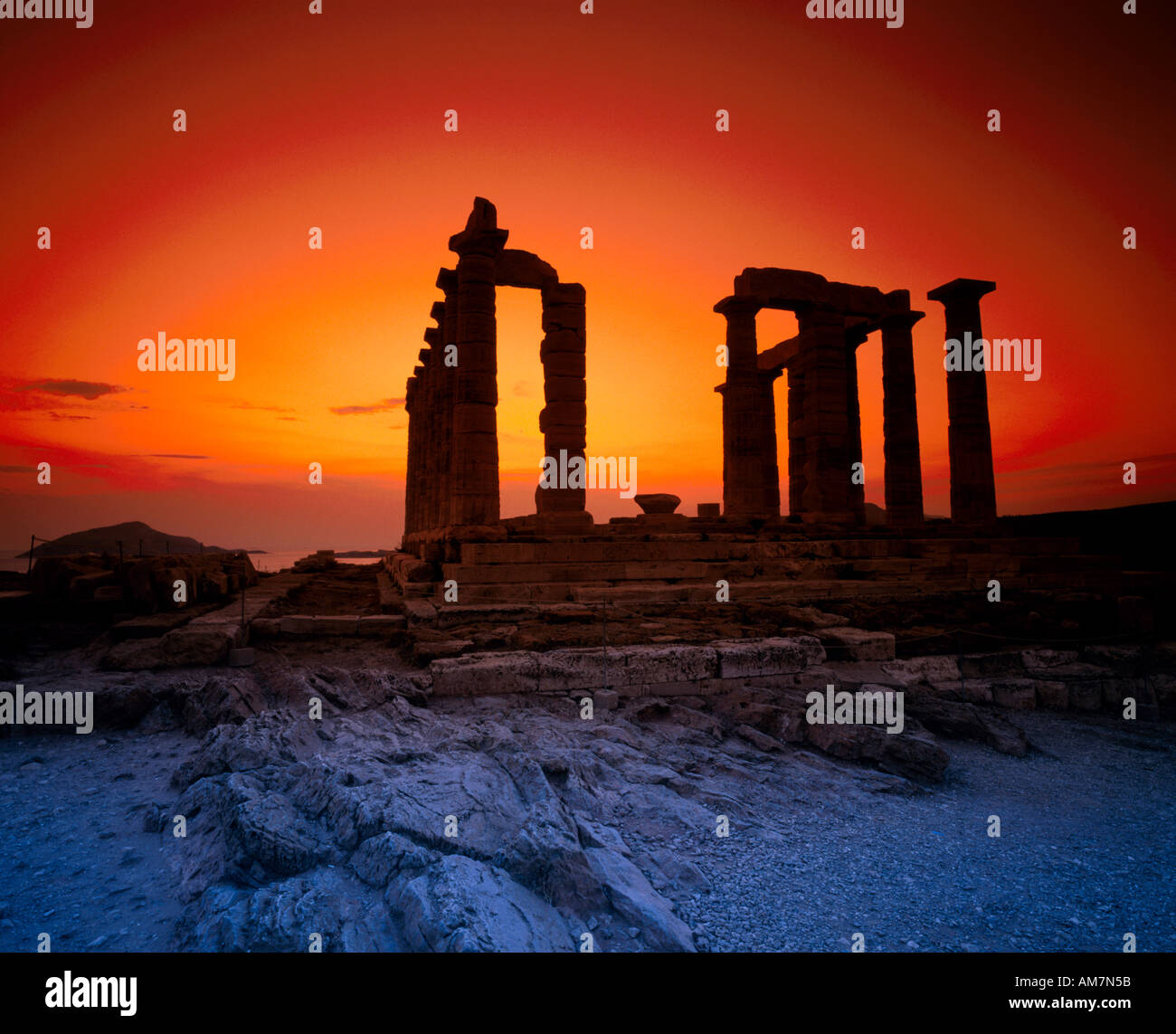 Classical romantic dramatic ruins of Sounion in silhouette against ...