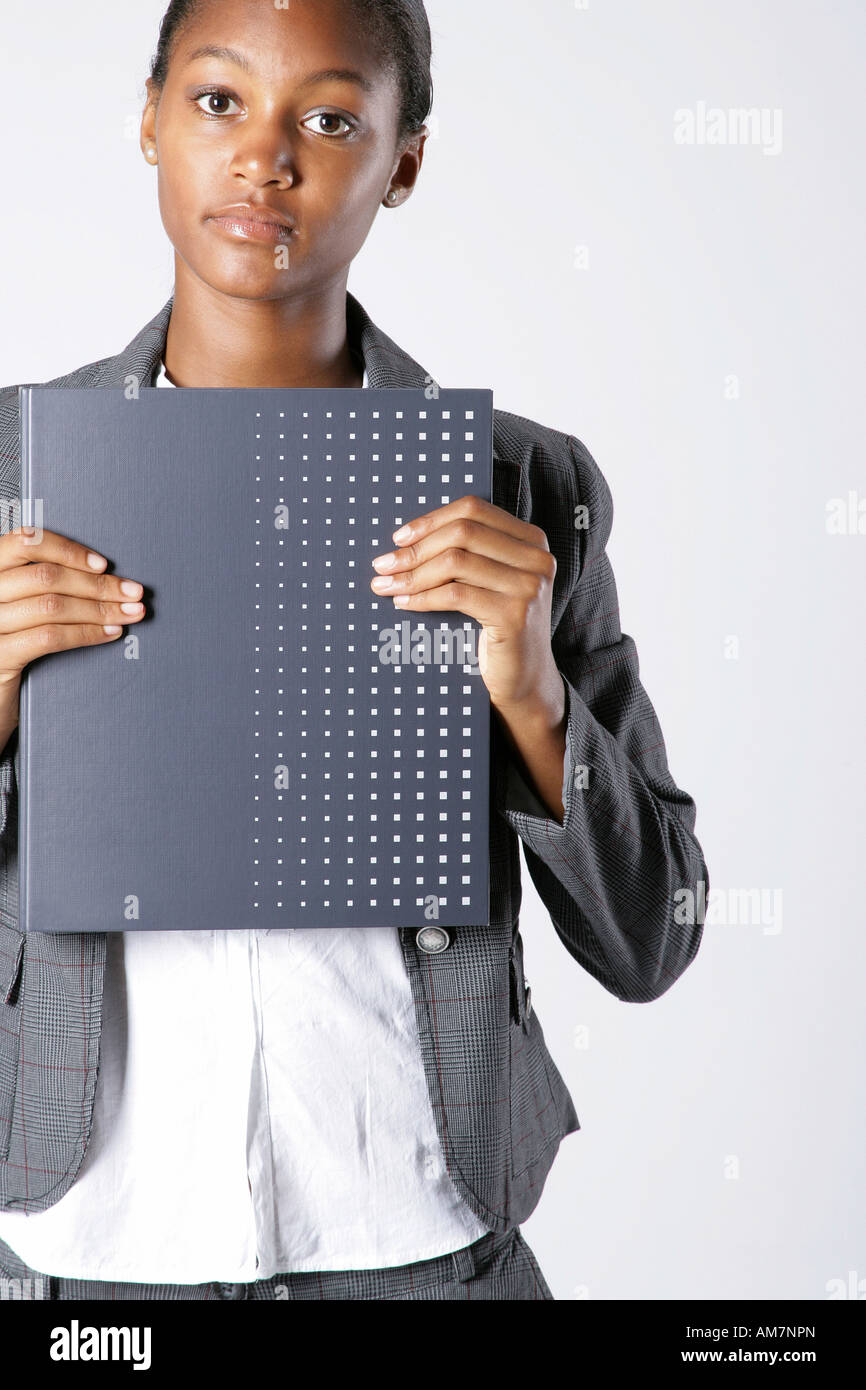 Young woman holding folder Stock Photo - Alamy