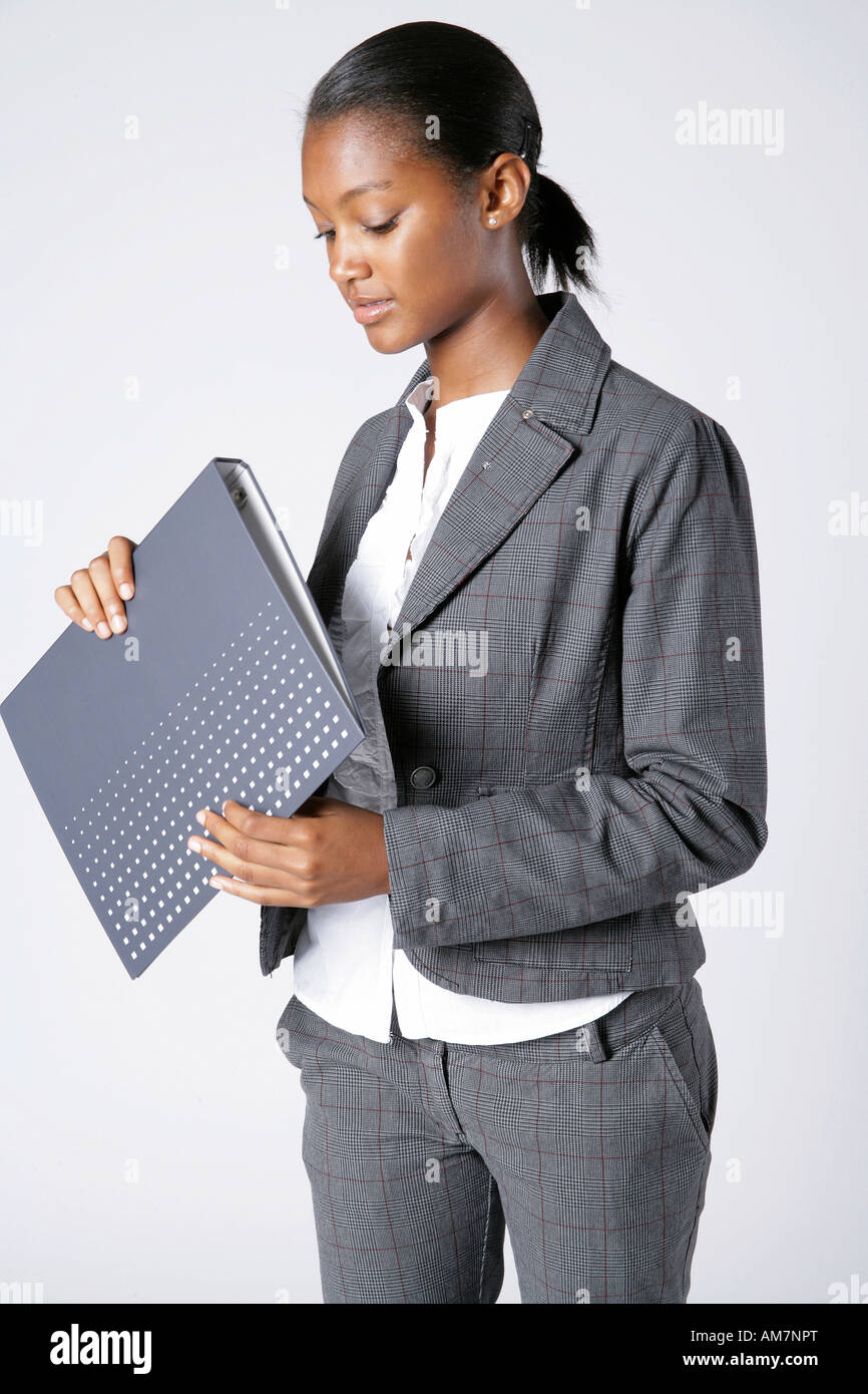 Young woman holding folder Stock Photo - Alamy