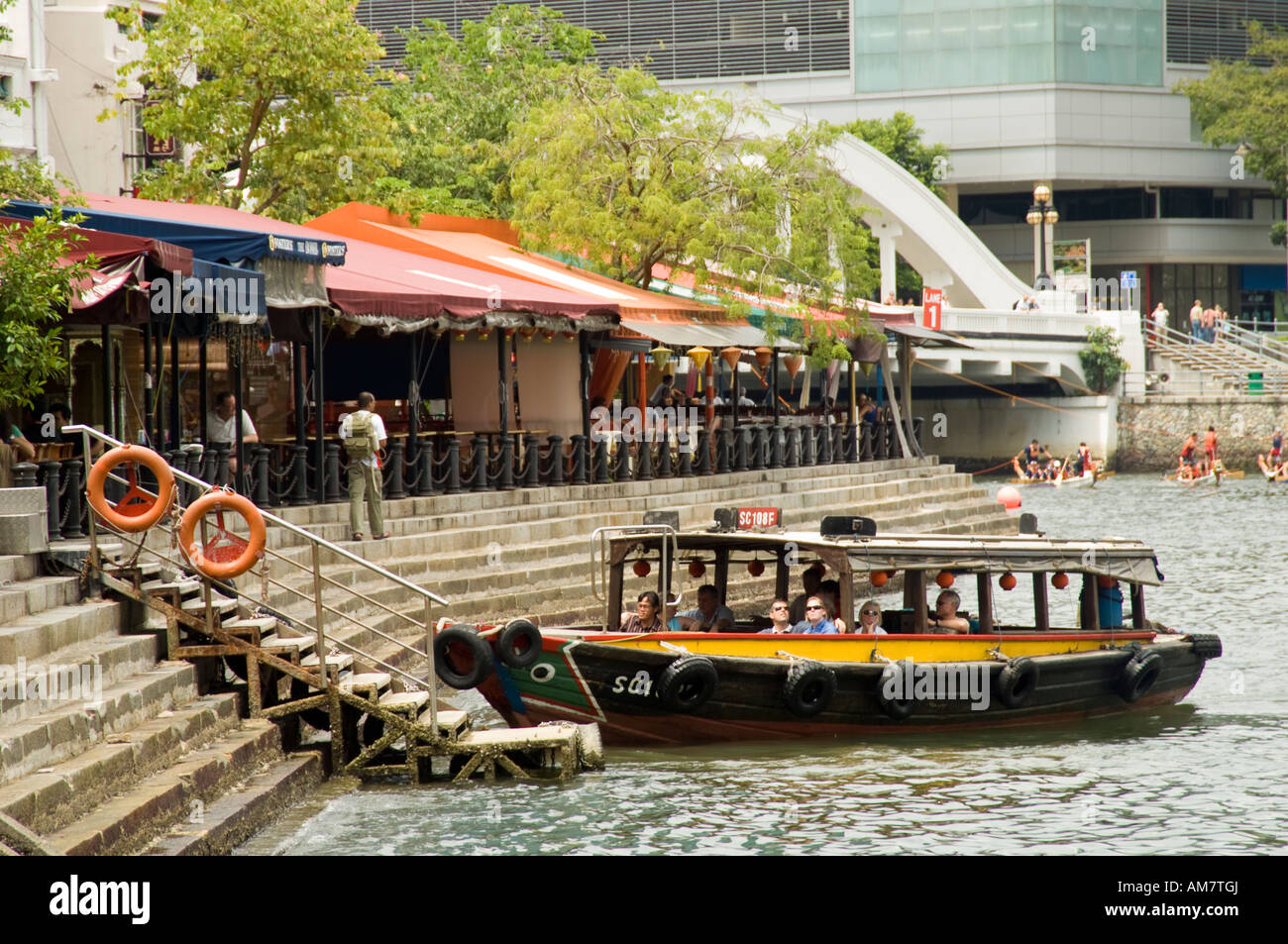 Water taxi in Singapore harbor Stock Photo - Alamy