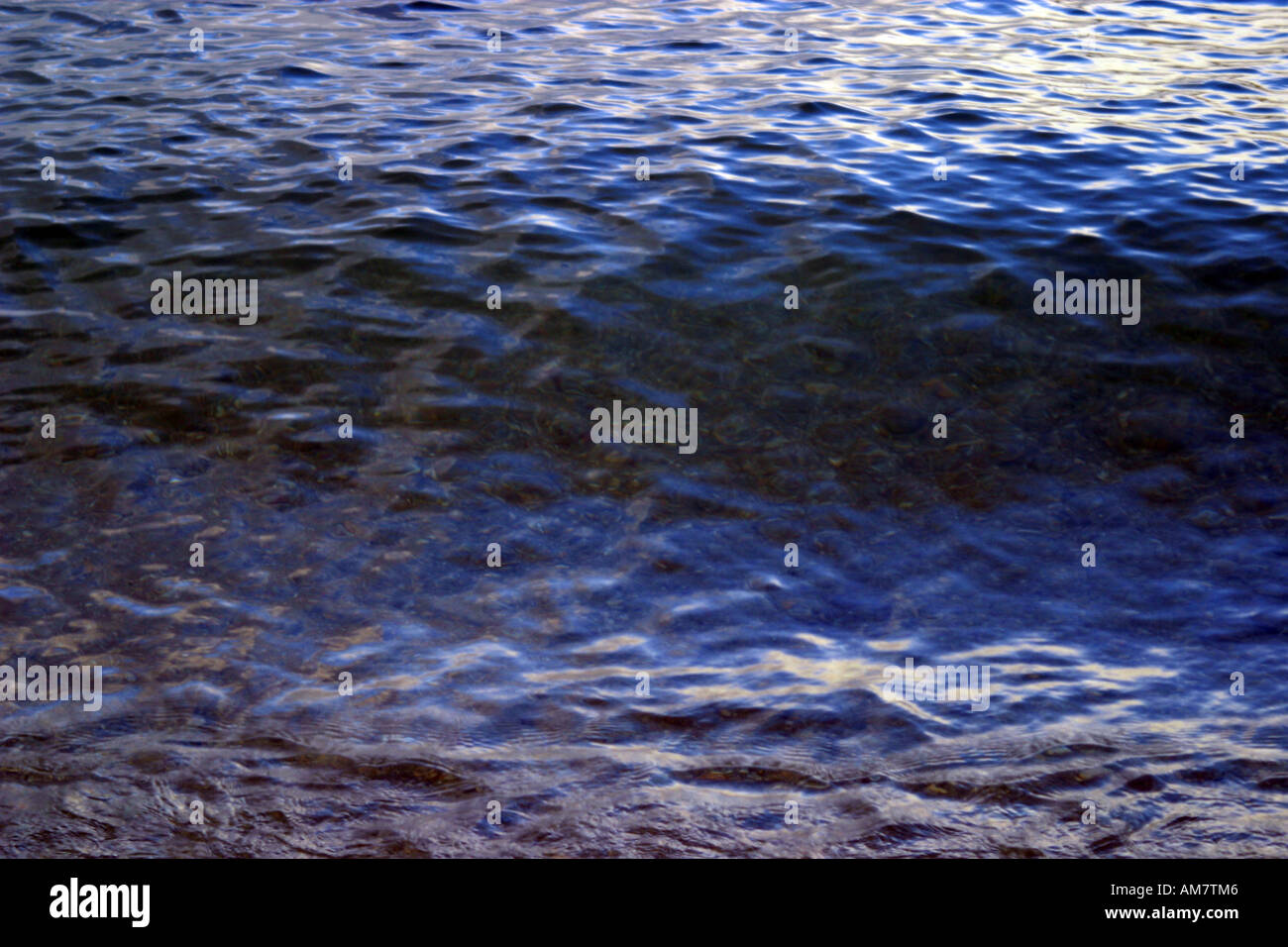 Sun reflecting in the ocean surface Stock Photo - Alamy