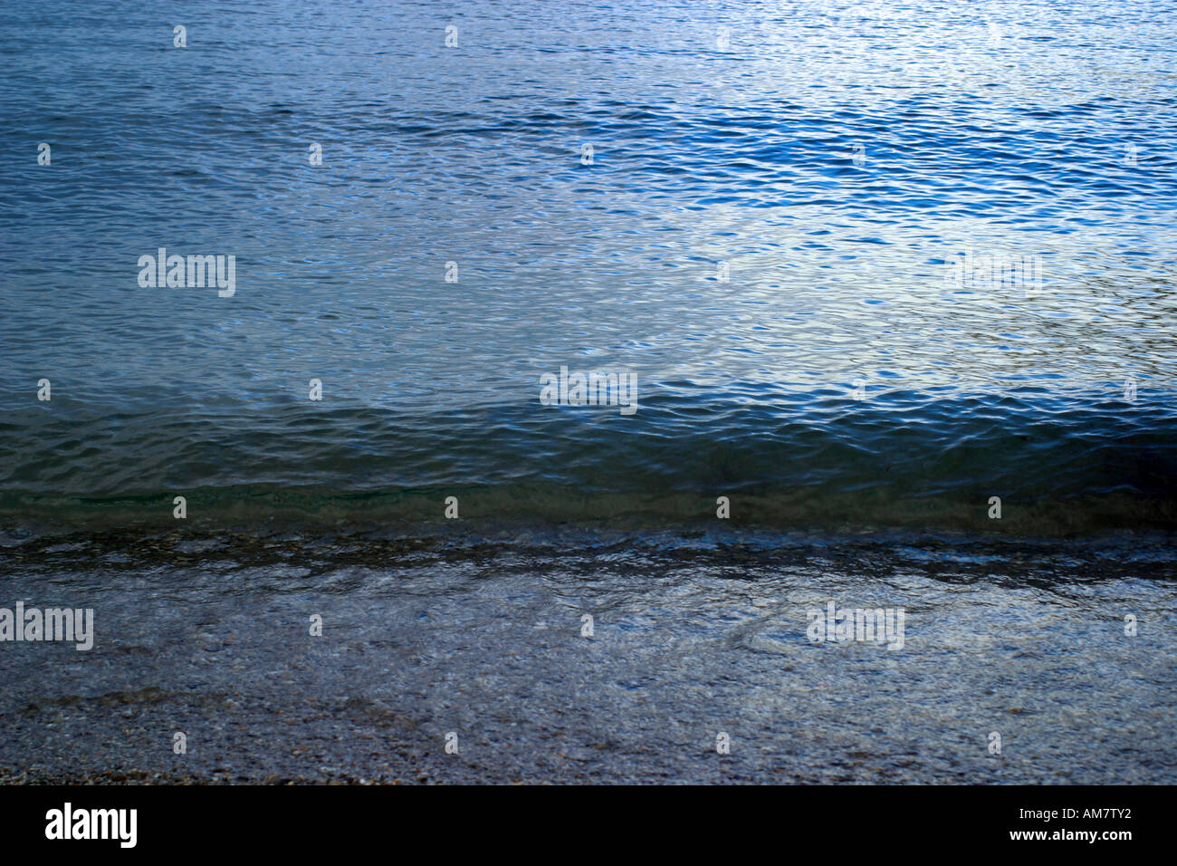 Sun reflecting in the ocean surface Stock Photo - Alamy