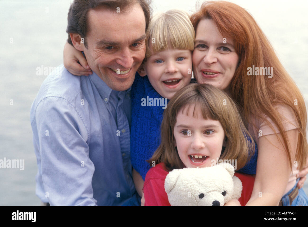 Family smiling, portrait Stock Photo - Alamy