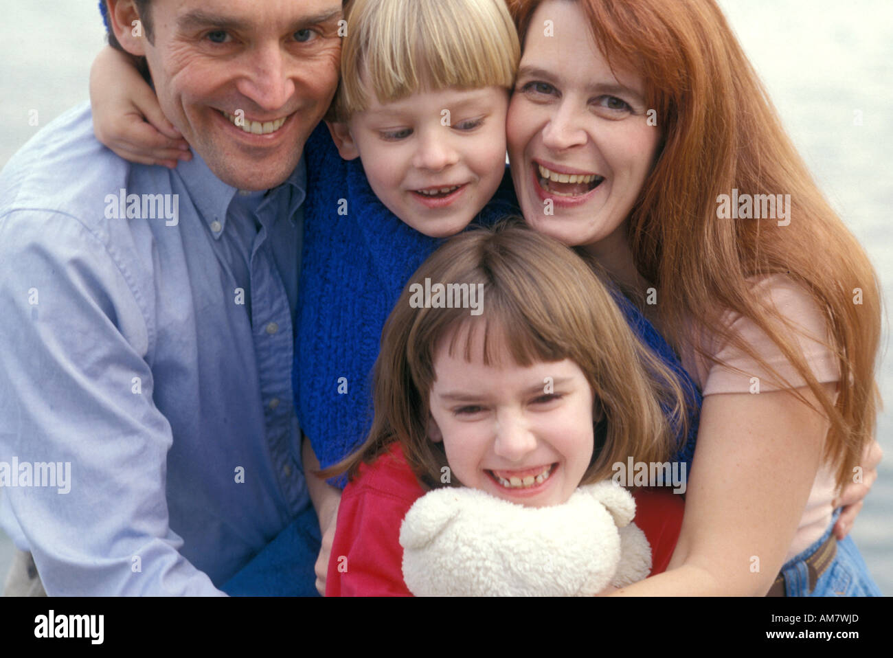 Family smiling, portrait Stock Photo - Alamy
