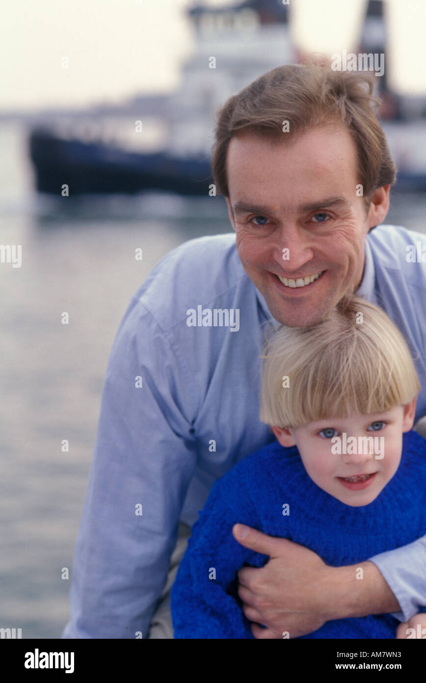 Father with son, smiling, portrait Stock Photo - Alamy