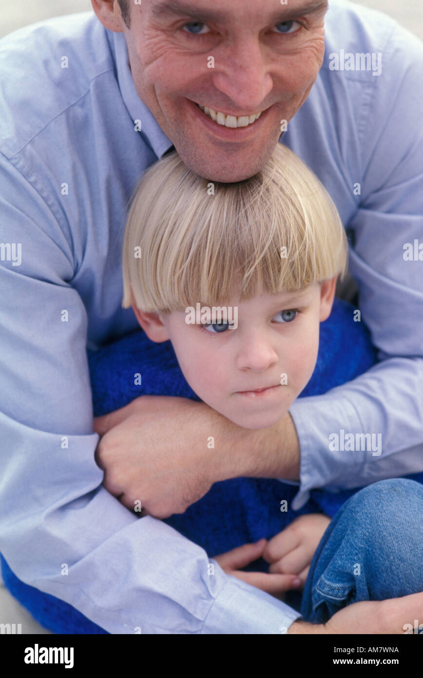 Father with son, smiling, portrait Stock Photo - Alamy