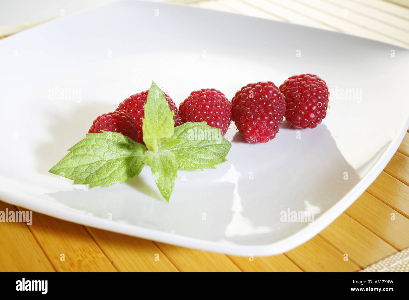 Fresh raspberries, mint Stock Photo - Alamy