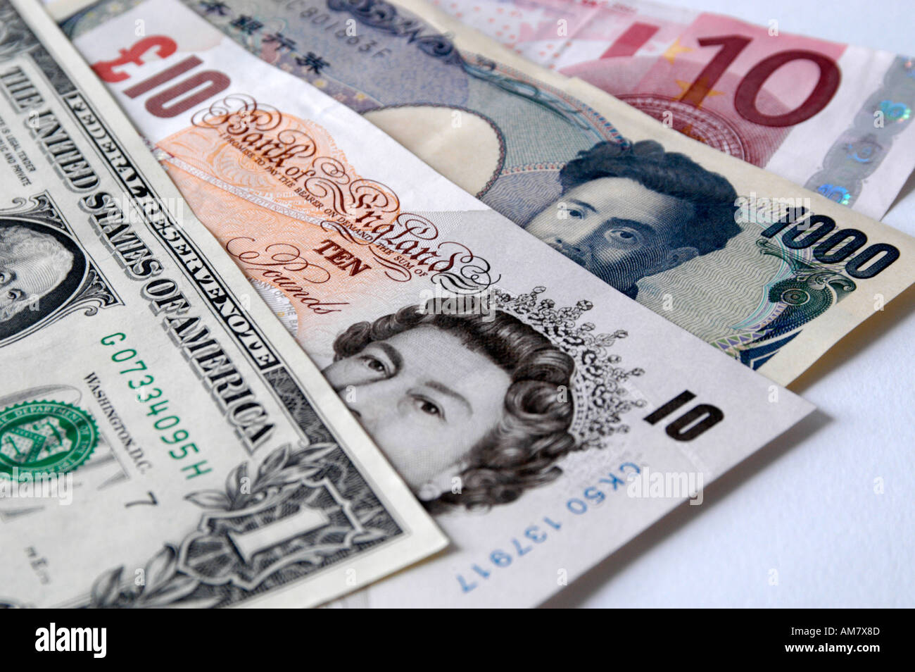 Mix of foreign currency banknotes Stock Photo - Alamy