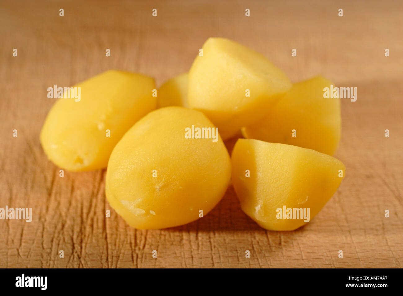 Peeled and cooked potatoes Stock Photo - Alamy