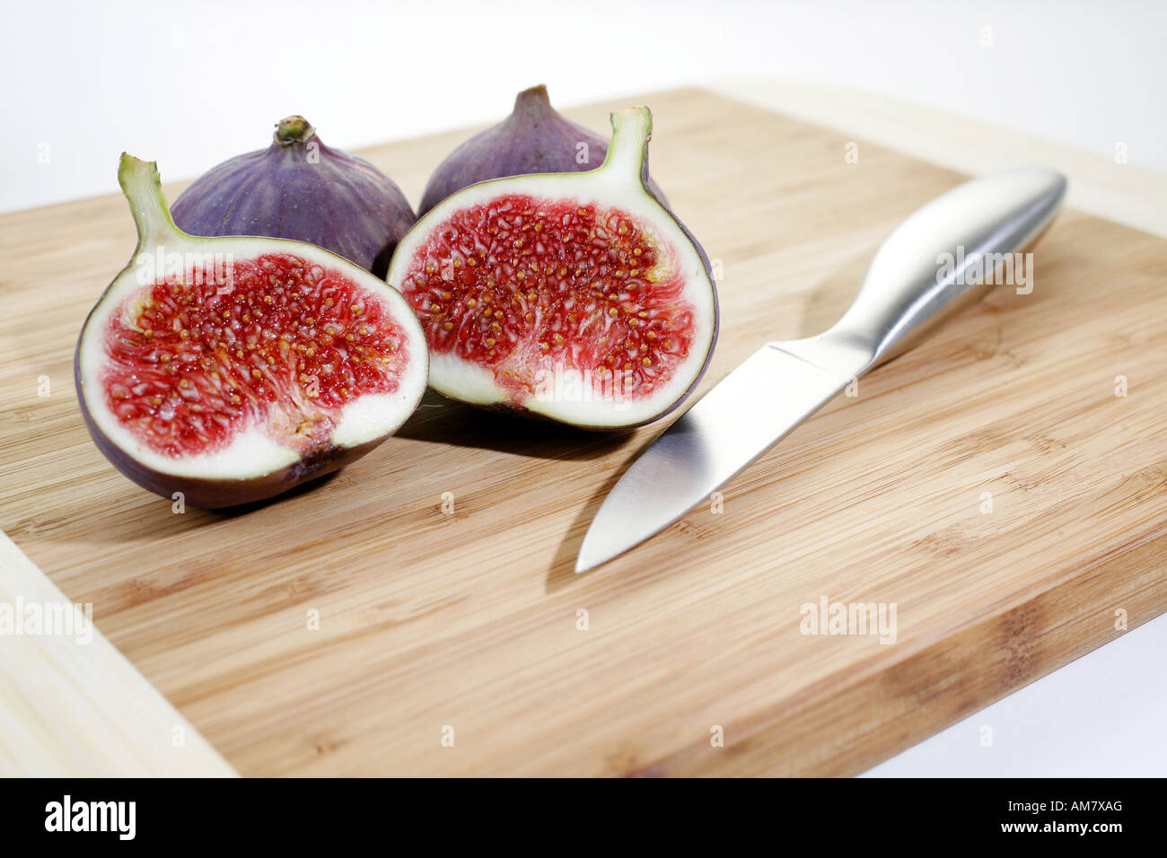 Figs, cut, halved Stock Photo - Alamy