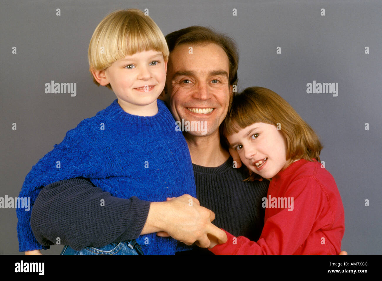 Father with children, smiling, portrait Stock Photo - Alamy