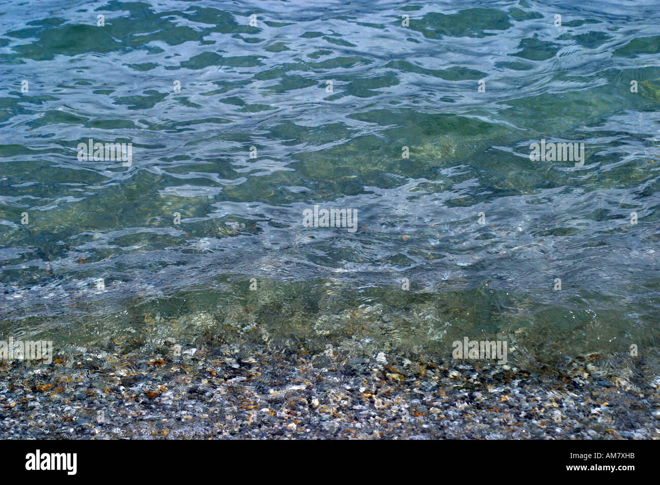 Sun reflecting off the ocean water surface Stock Photo - Alamy