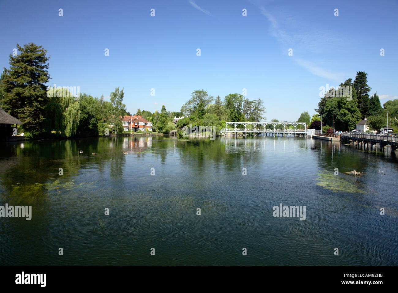 Henley lock and weir on the river Thames from the Thames path on a hot ...