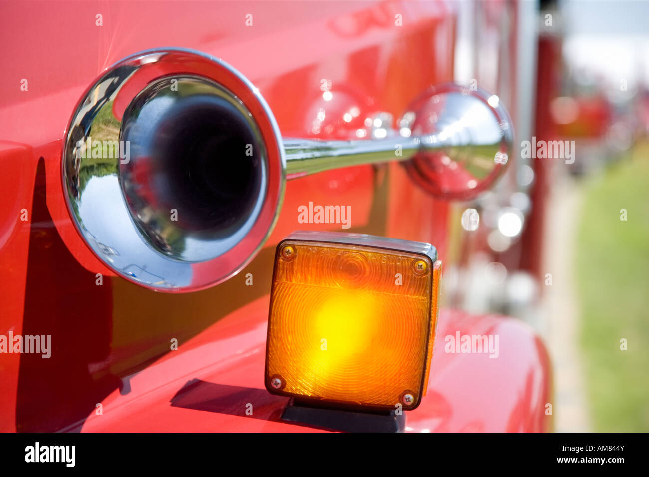 Silver siren mounted on the fender of a fire truck Stock Photo - Alamy