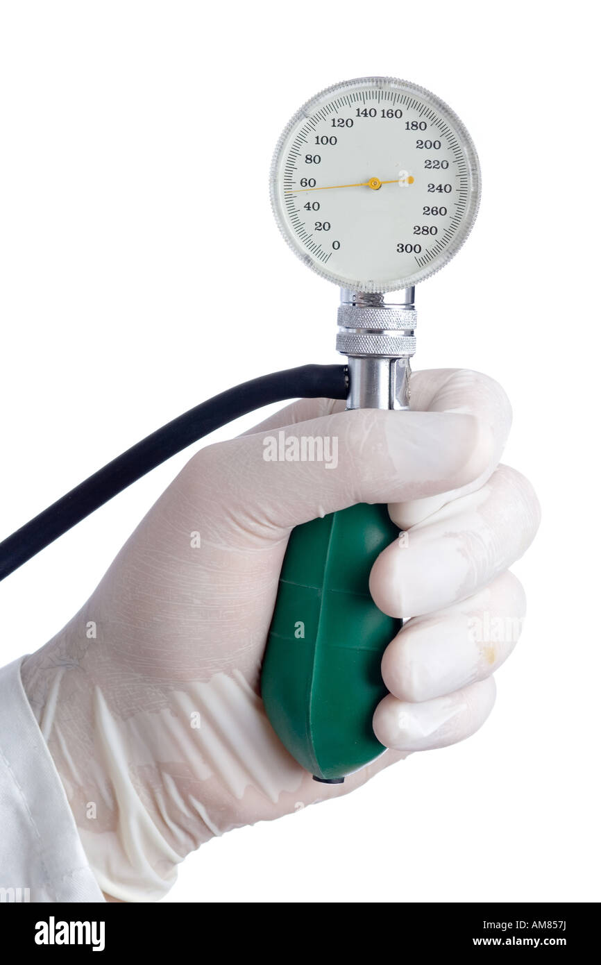 Hand holding a device for measuring blood pressure Stock Photo - Alamy