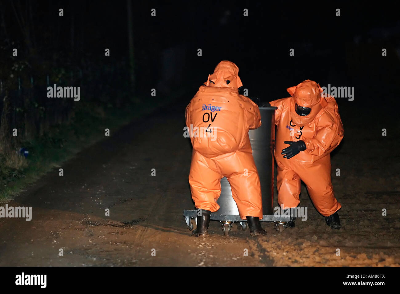 A barrel with the toxic hydrazine is recovered Stock Photo - Alamy