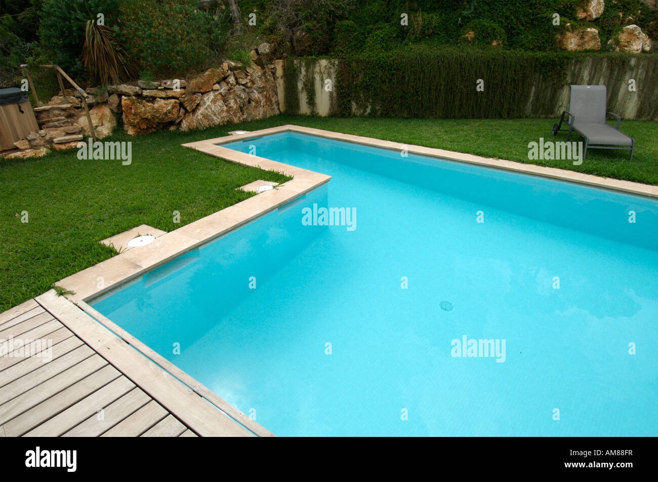 A swimming pool in the garden Stock Photo - Alamy