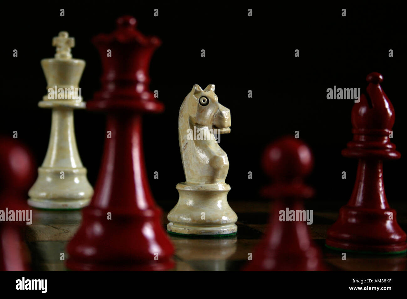Red and white chess pieces on a board, chessmen, still life Stock Photo ...