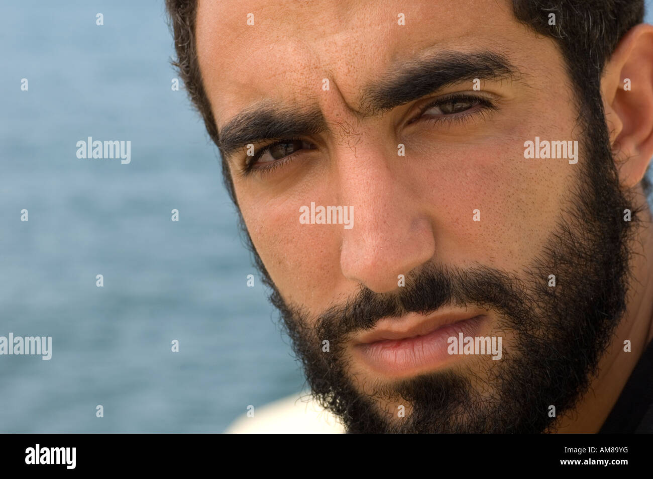 Close up of an Angry Arabic man Stock Photo - Alamy
