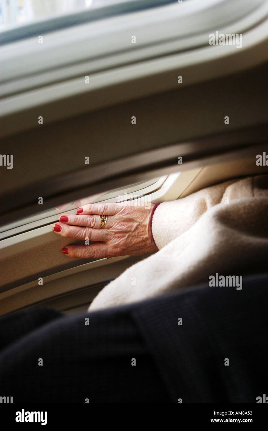 Hand armrest plane hi-res stock photography and images - Alamy