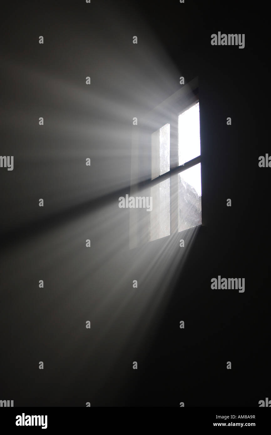 Sunbeams though a window Stock Photo - Alamy