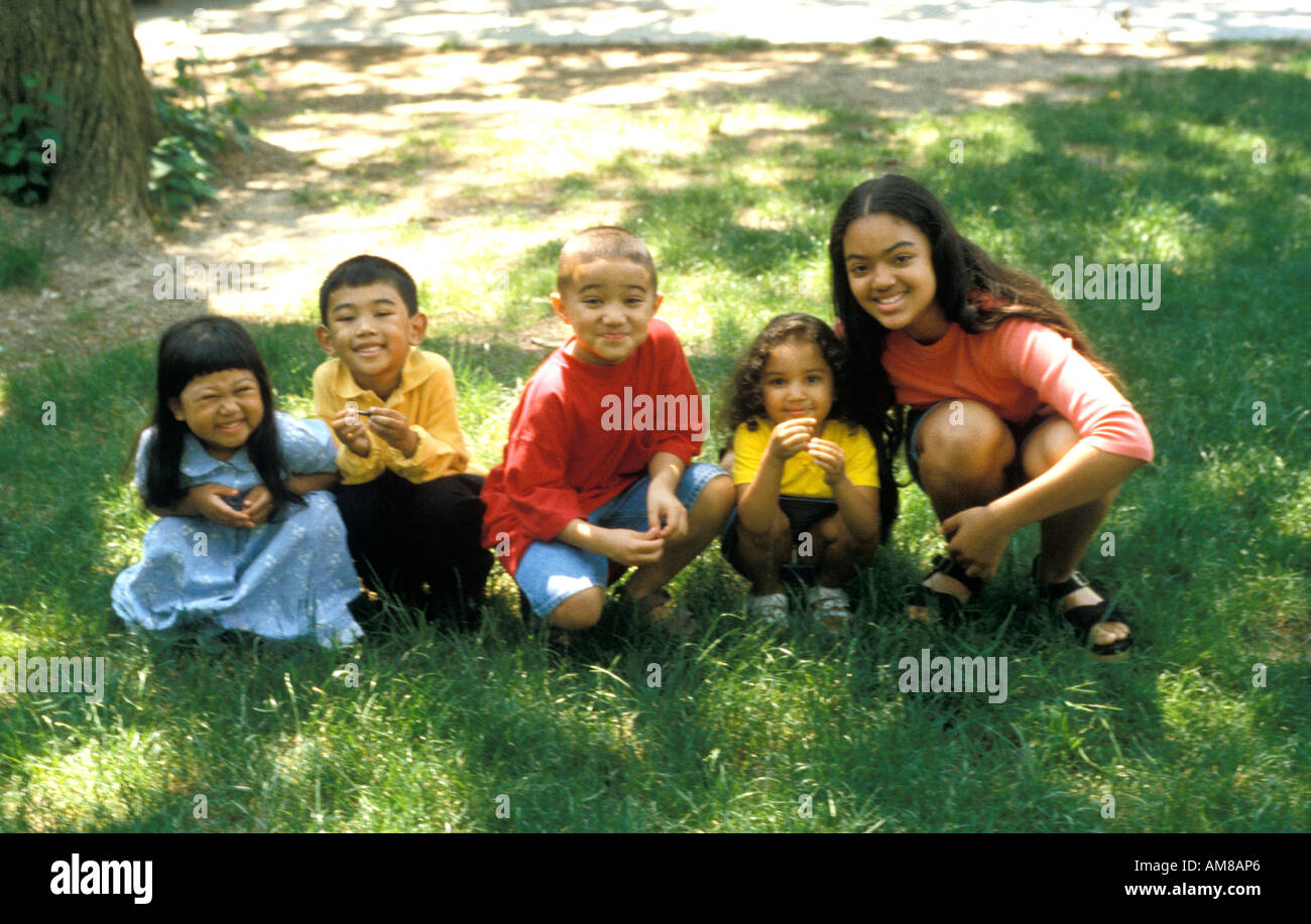 Kids sitting together, portrait Stock Photo - Alamy