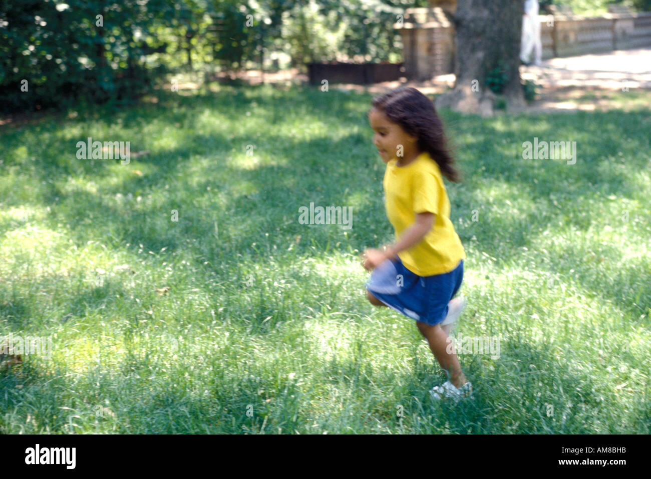 Excited african american girl running hi-res stock photography and ...