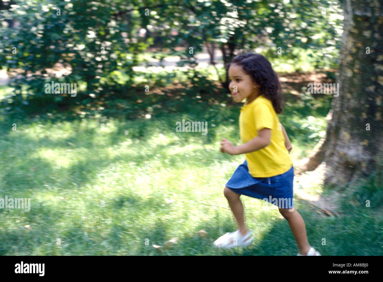 Excited african american girl running hi-res stock photography and ...