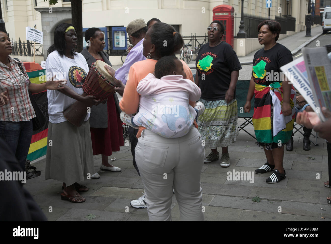 Women drumming,singing and dancing Zimbabwe anti Mugabe democracy vigil ...