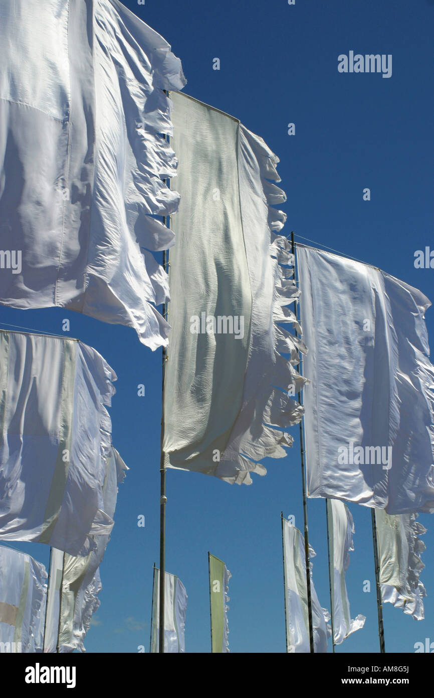Flags flying in the wind Stock Photo - Alamy