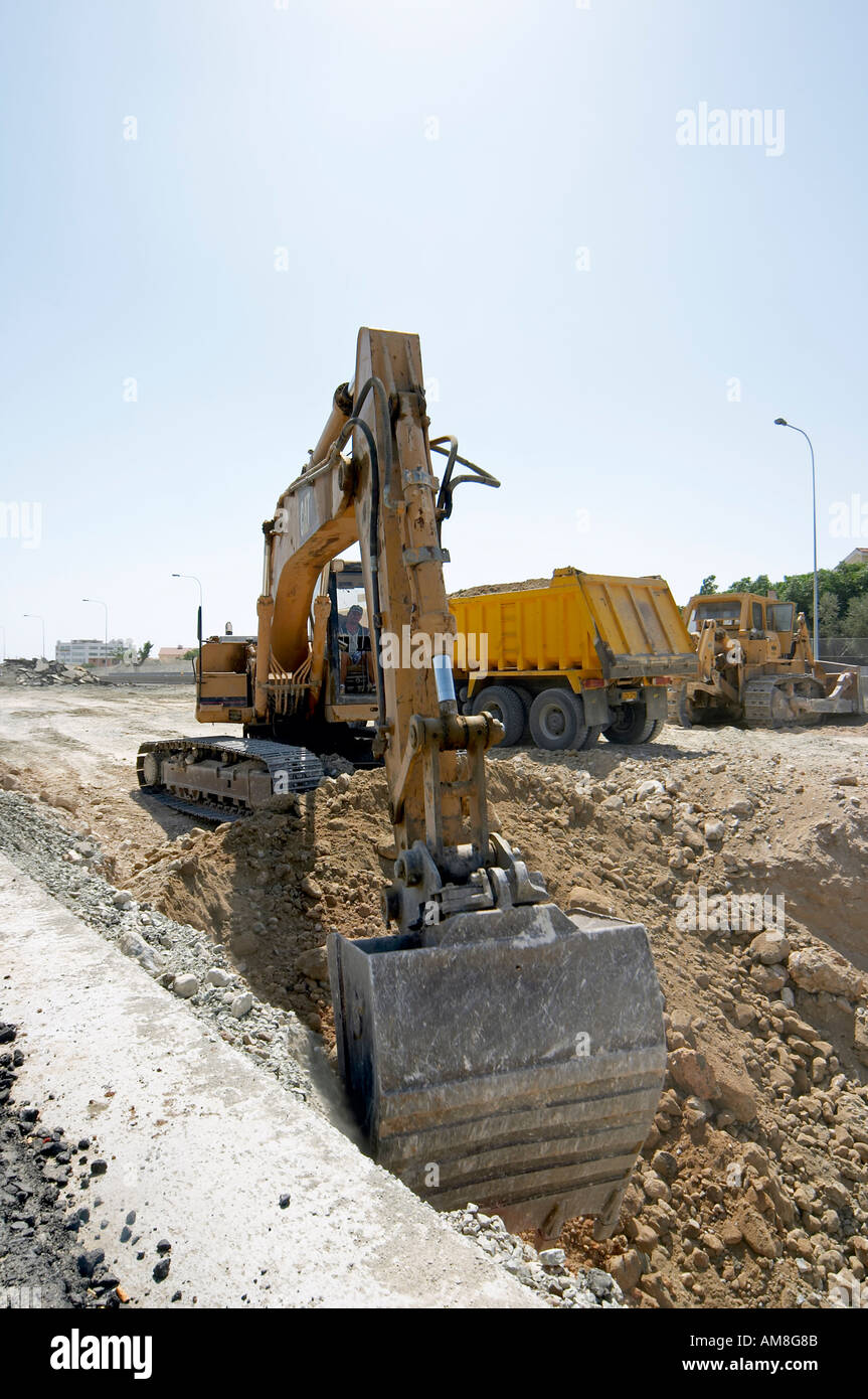 Excavator and dump truck Civil Engineering plant on Road construction ...