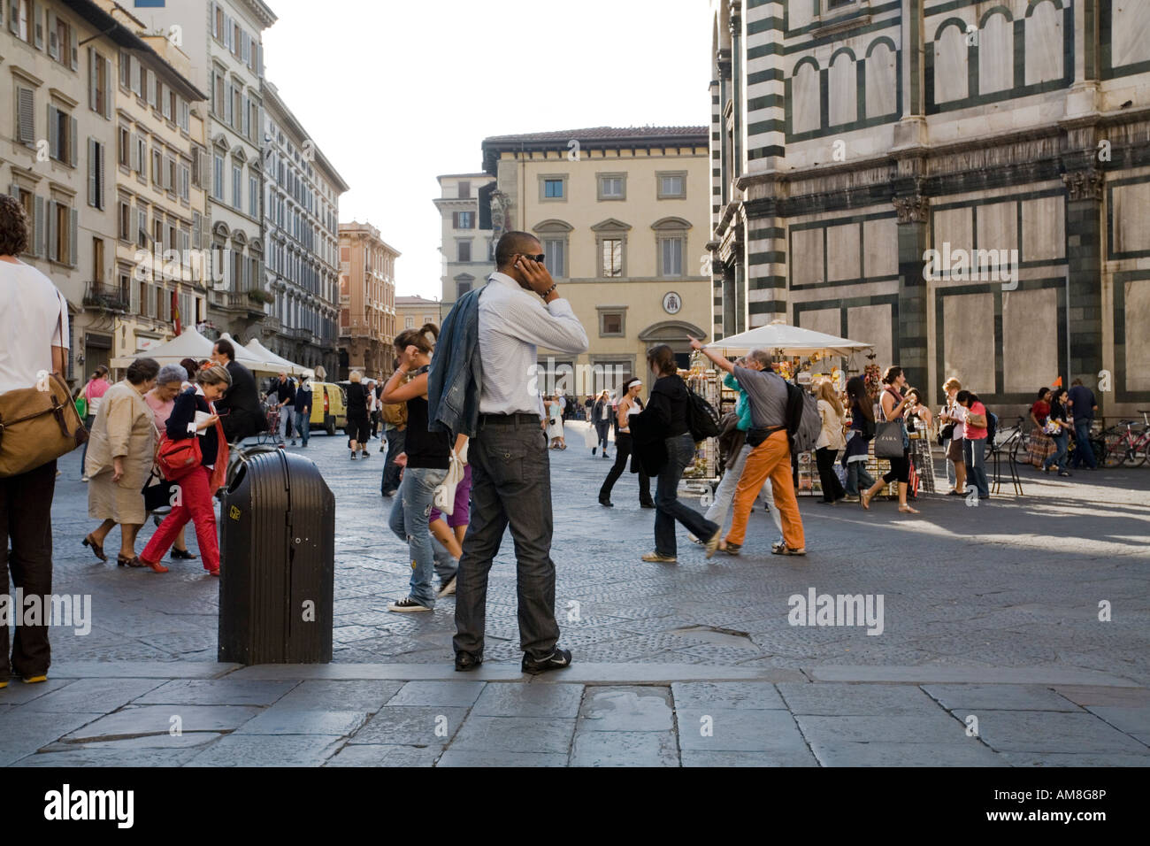 Man using a mobile phone, Florence, Italy Stock Photo - Alamy
