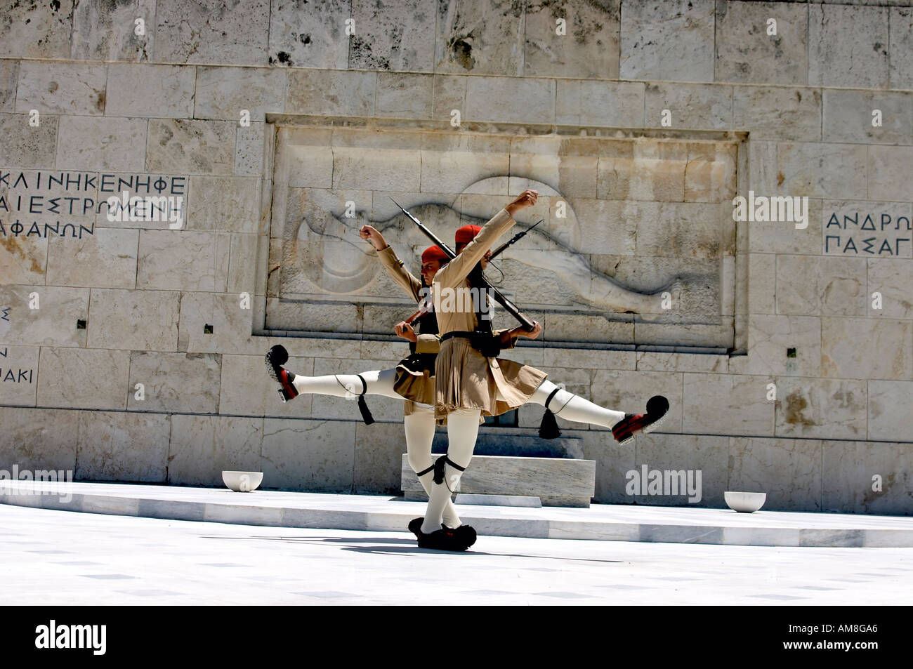 Greek Evzone Guard soldiers in traditional dress marching outside the ...