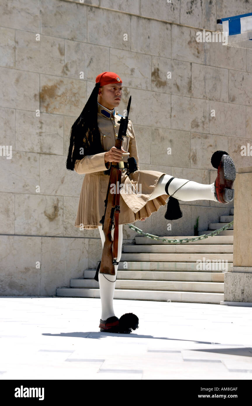 Greek Evzone soldier in traditional dress marching outside the Tomb of ...