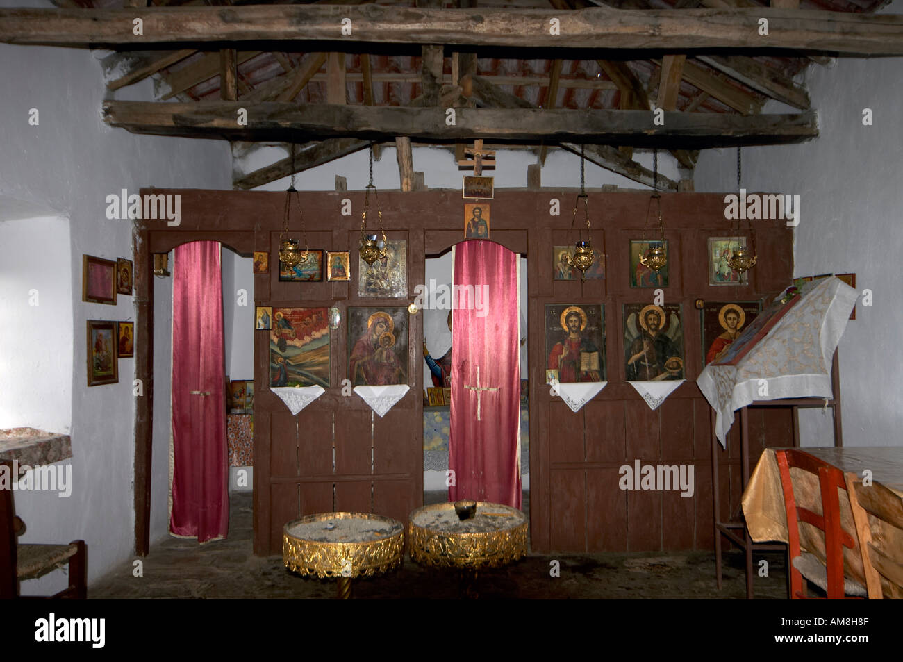 Small Greek Orthodox church interior with icons in Paleos Panteleimonos ...