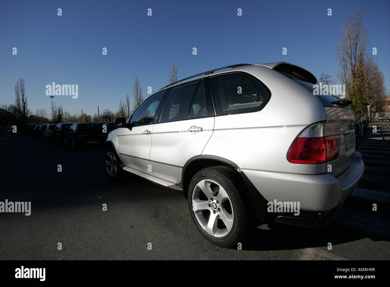 Bmw Suv parked in front of the Fiat. Turin, Italy Stock Photo - Alamy