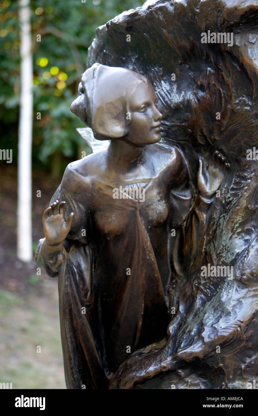 Woman fairy on statue of Peter Pan Hyde Park London W2 England Stock ...