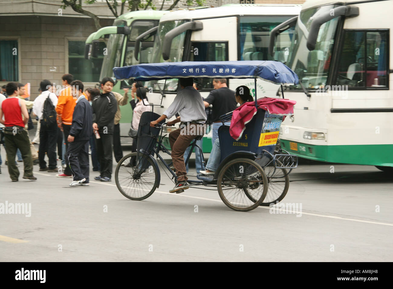 Three wheel taxi Fuyang China Stock Photo - Alamy
