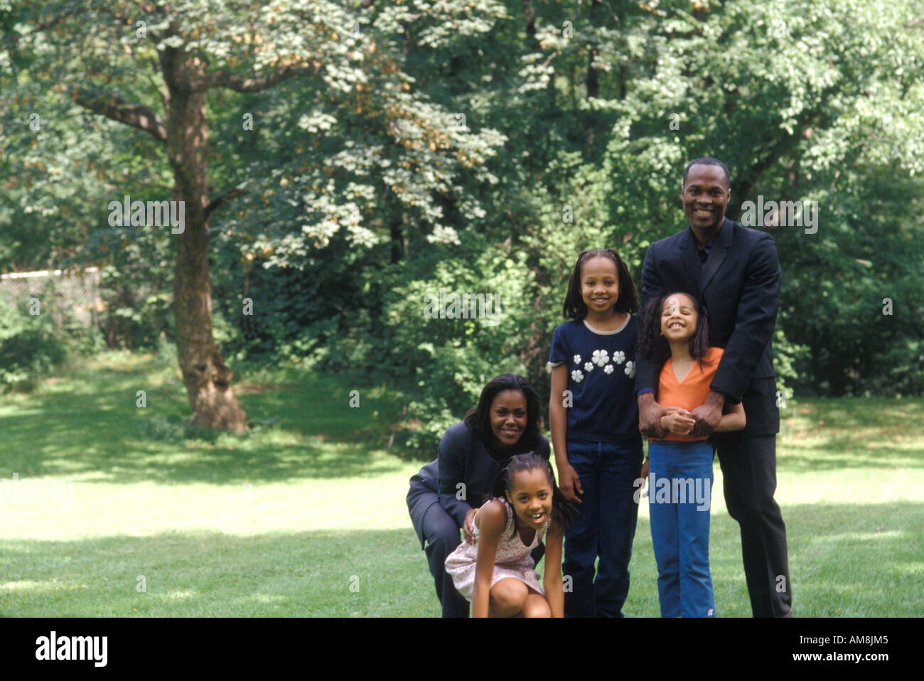 Parents with daughters, portrait Stock Photo - Alamy