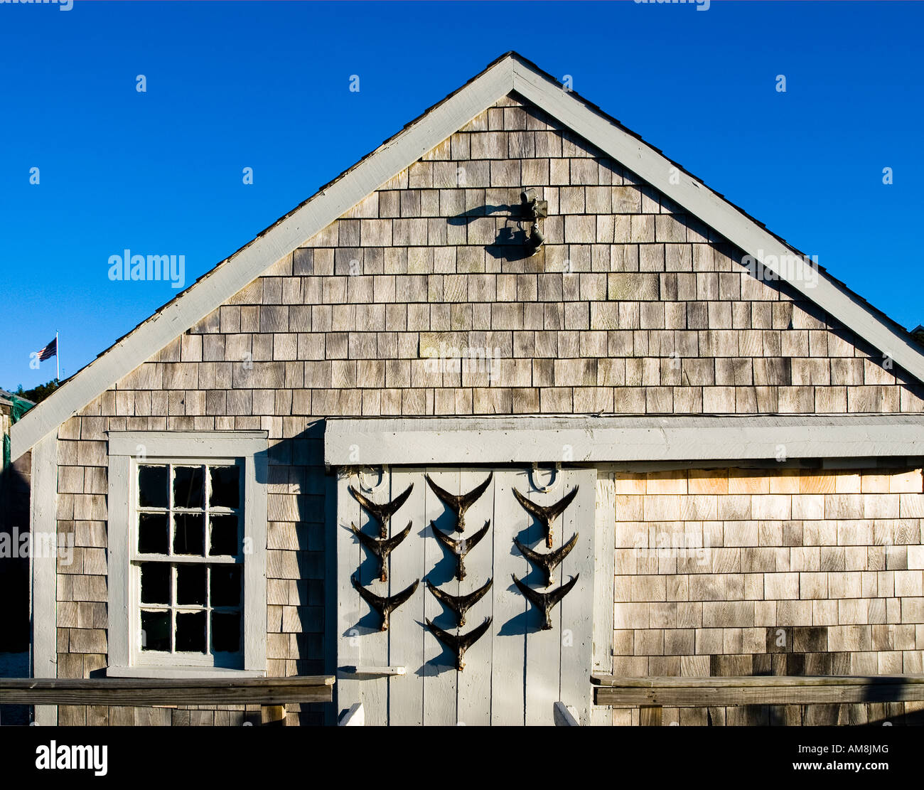 Rustic marina shack with fish tail display on door Taylors Pond Cape ...