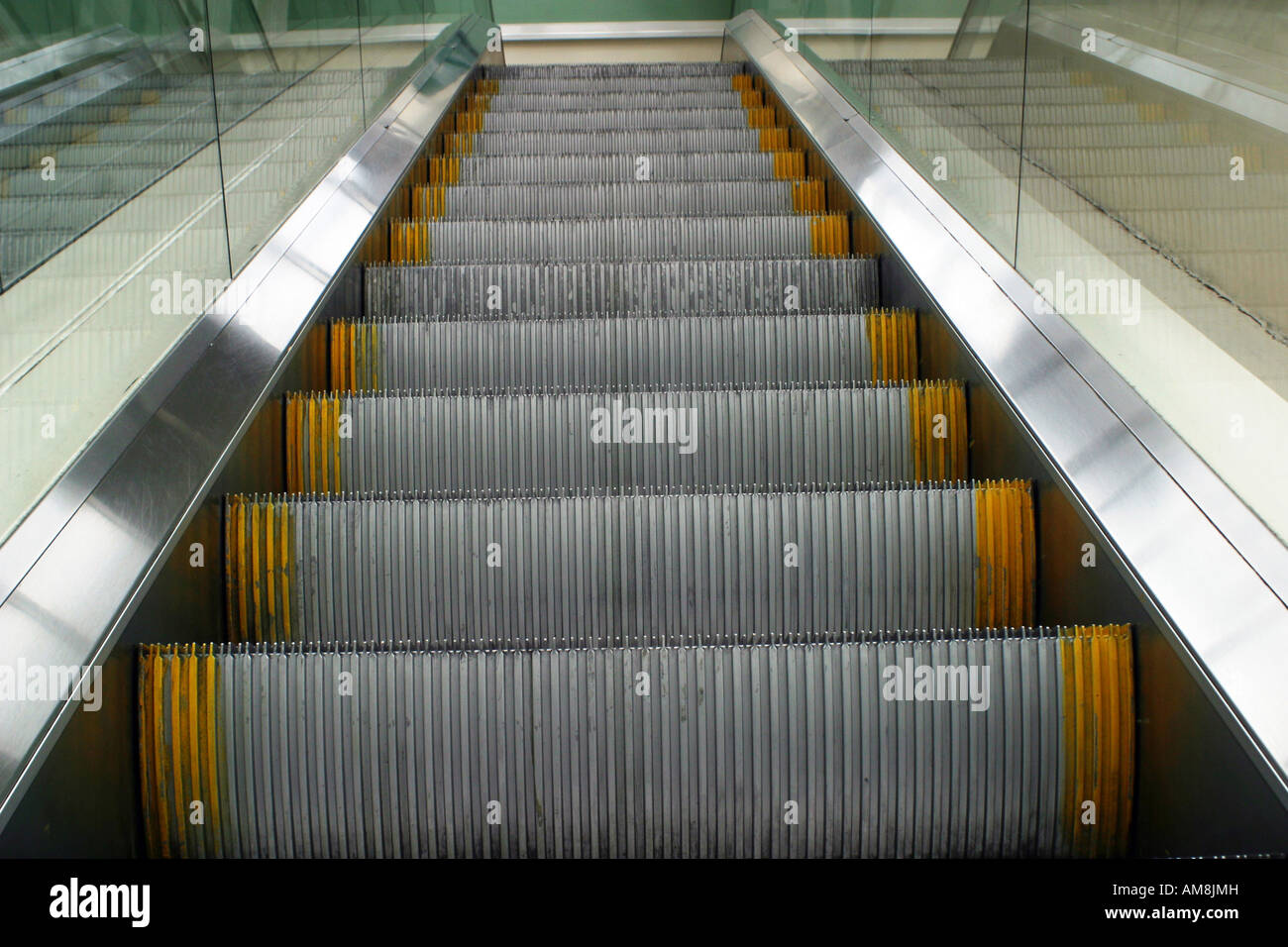 Escalator in a shopping mall Stock Photo - Alamy