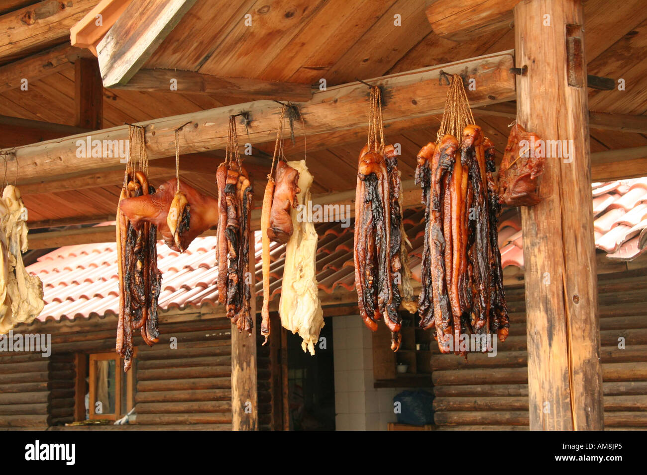 Meat hanging outside by the kitchen door for curing Barbizon Vacation ...