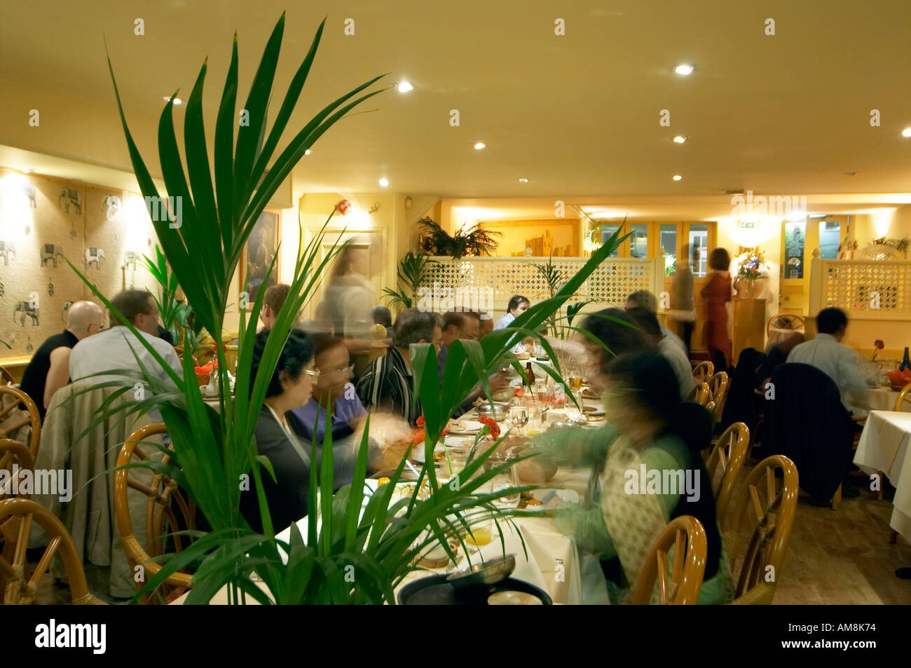 Diners and waiters in Haandi Indian Restaurant London SW3 Stock Photo ...